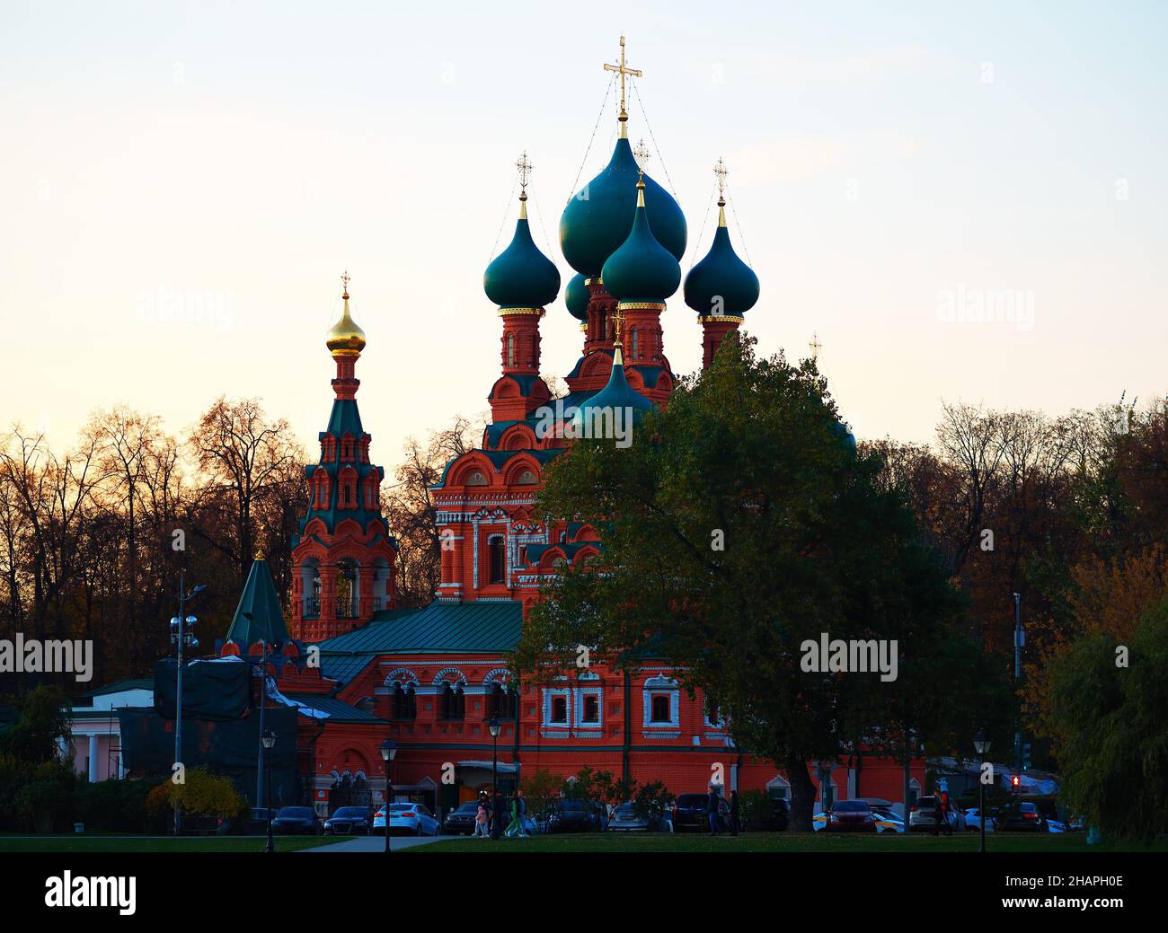 Orthodox church during sunset time background Stock Photo - Alamy