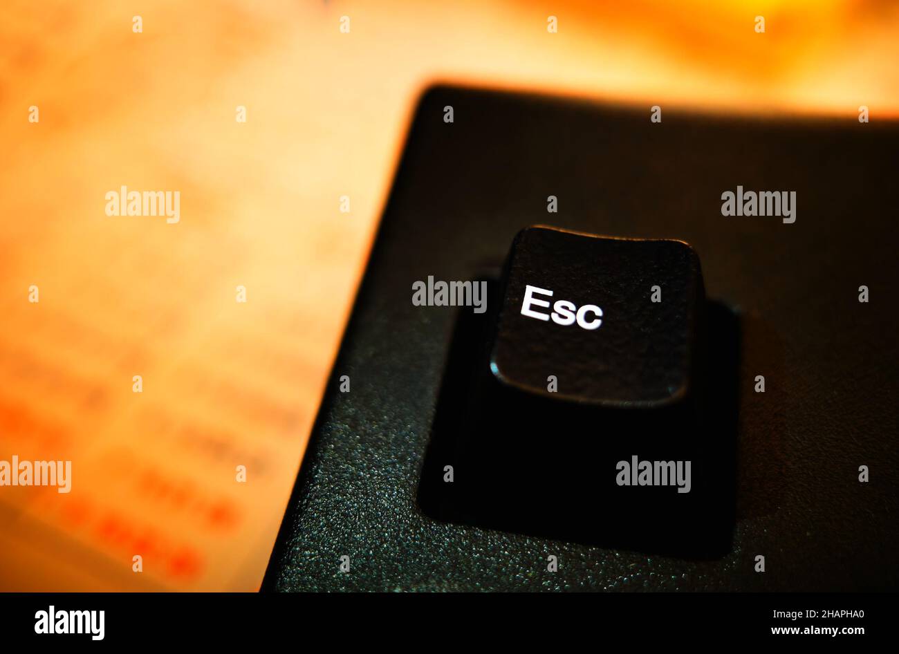 Esc key on English computer keyboard background Stock Photo - Alamy