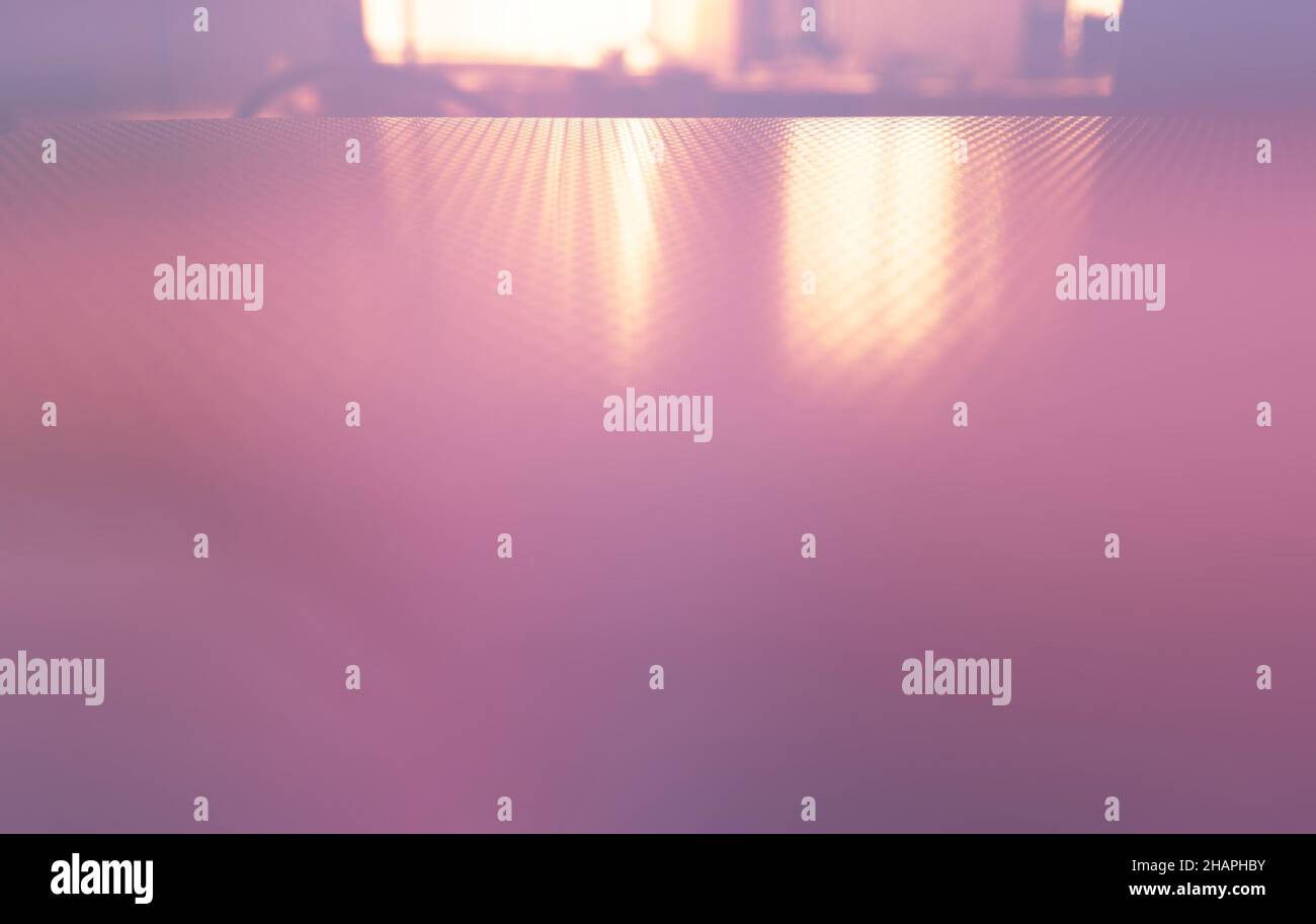 Carbon perforated table texture bokeh backdrop Stock Photo - Alamy