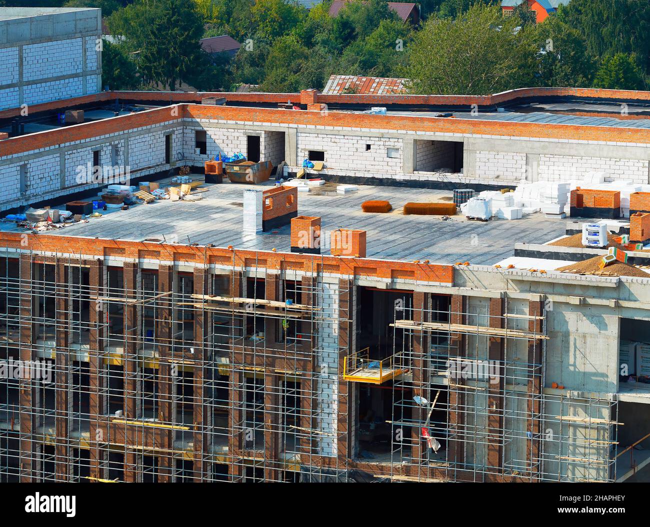 Building at construction site city background Stock Photo - Alamy