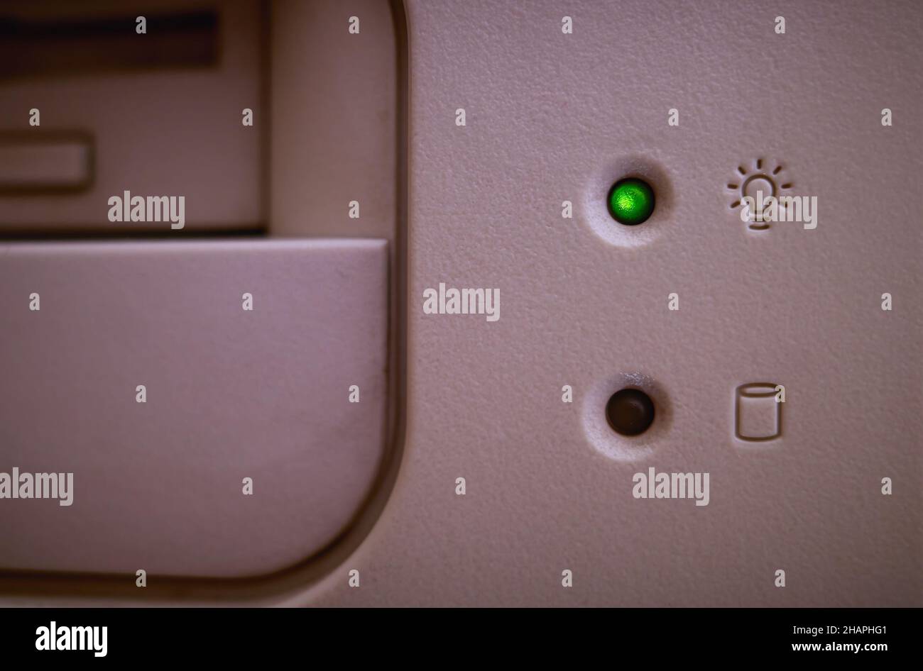 Led green light on vintage computer case background Stock Photo - Alamy