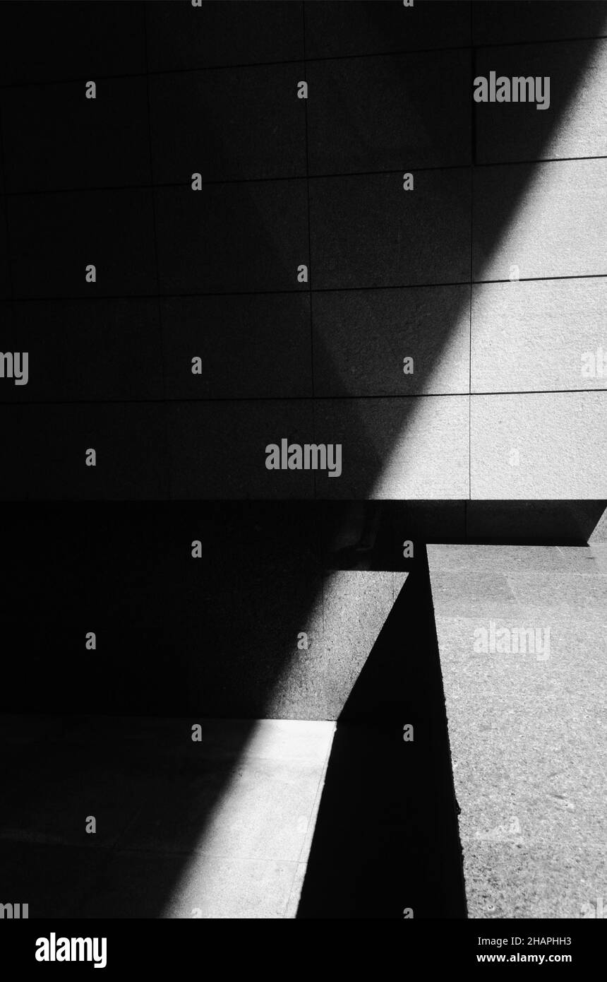 Diagonal sun rays illuminating simple architecture Stock Photo - Alamy