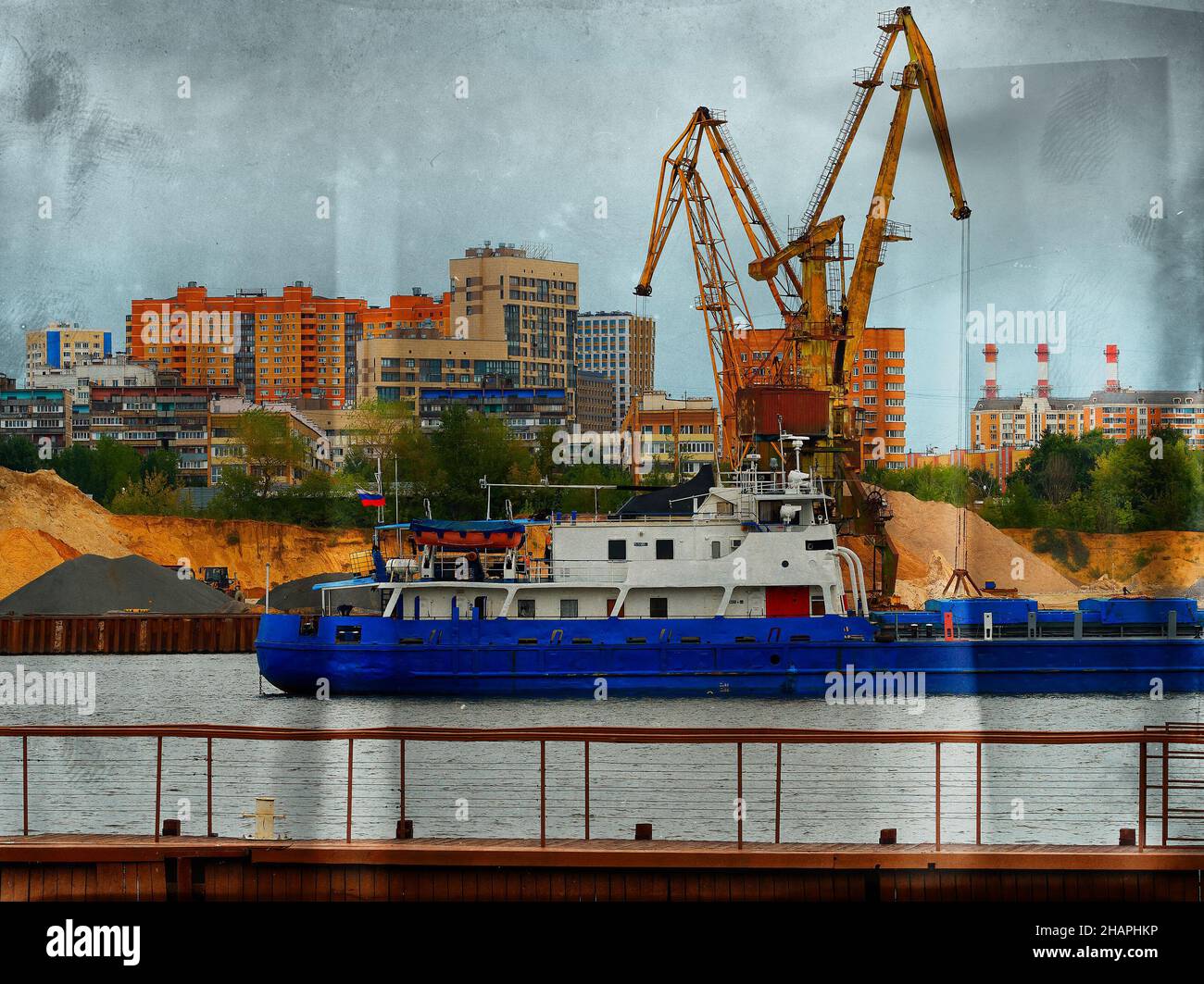 Cargo loader at Moscow port vintage postcard Stock Photo - Alamy