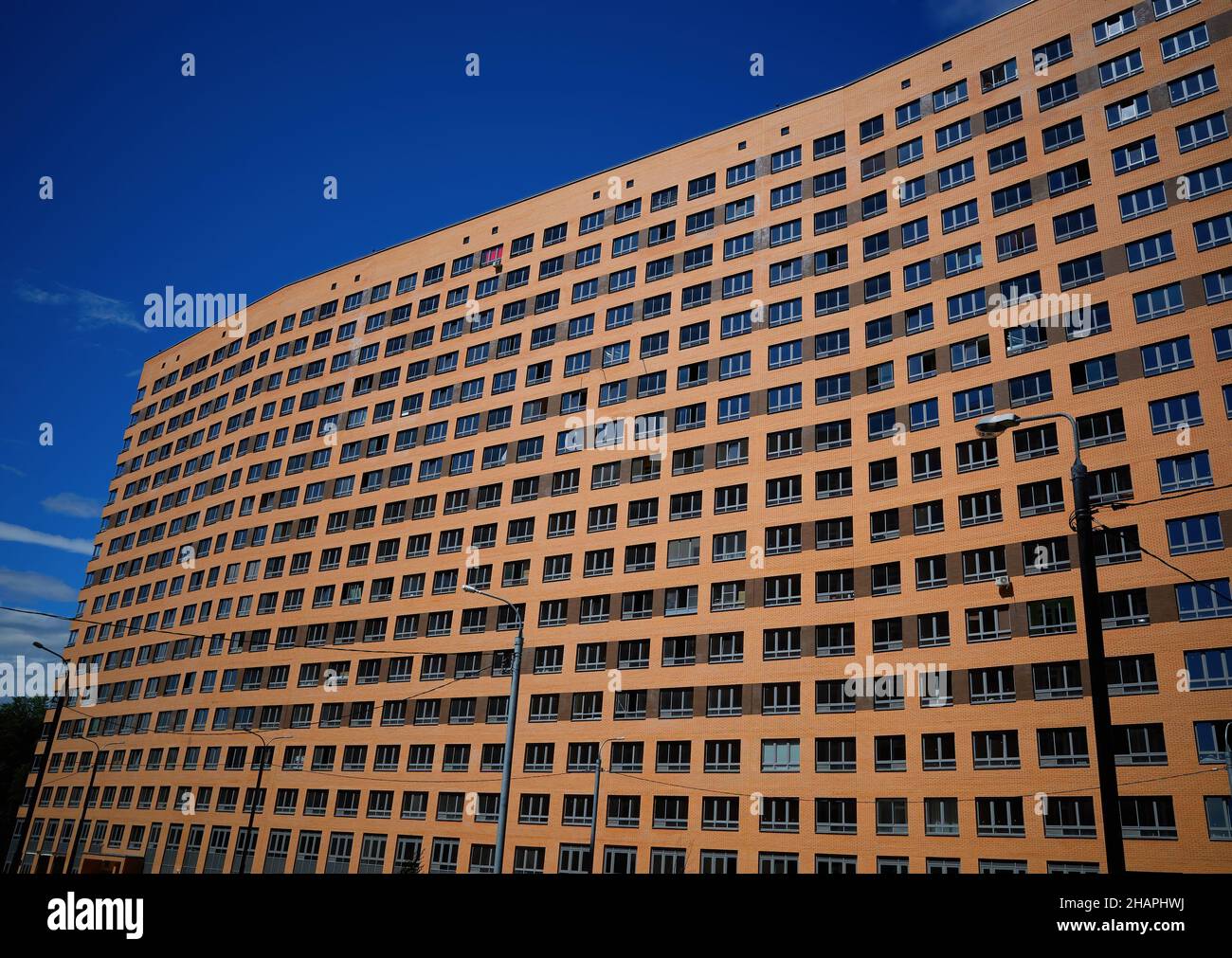 Massive multi-storied building architecture background Stock Photo - Alamy