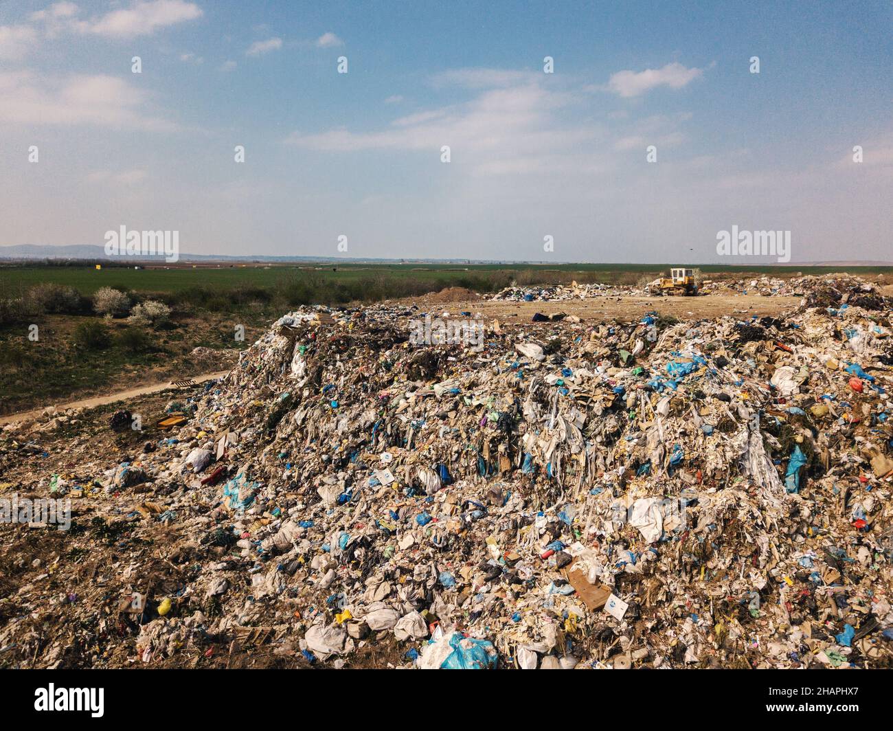 Proof of human negligence. On picture big pile of trash ruining nature ...