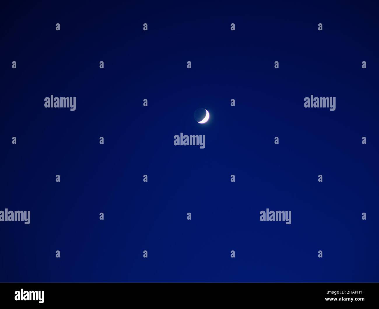 Night moon in blue sky background Stock Photo - Alamy