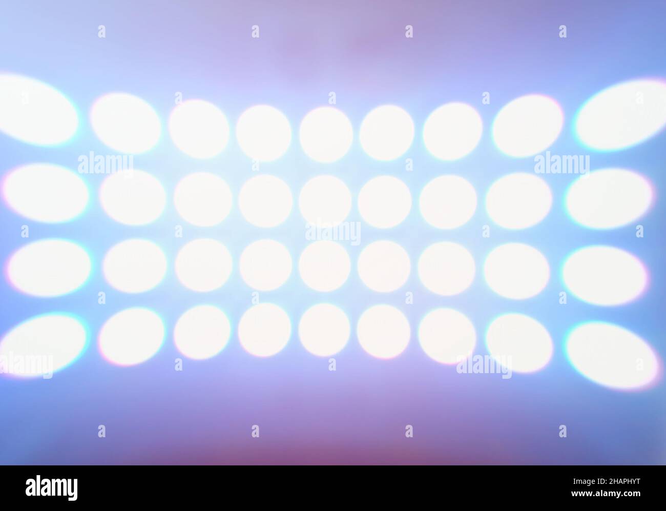 Curved rows of led lamps abstract backdrop Stock Photo - Alamy