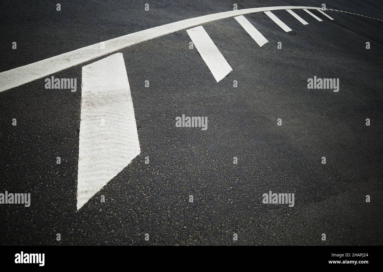 Curved traffic marking line transport background Stock Photo - Alamy