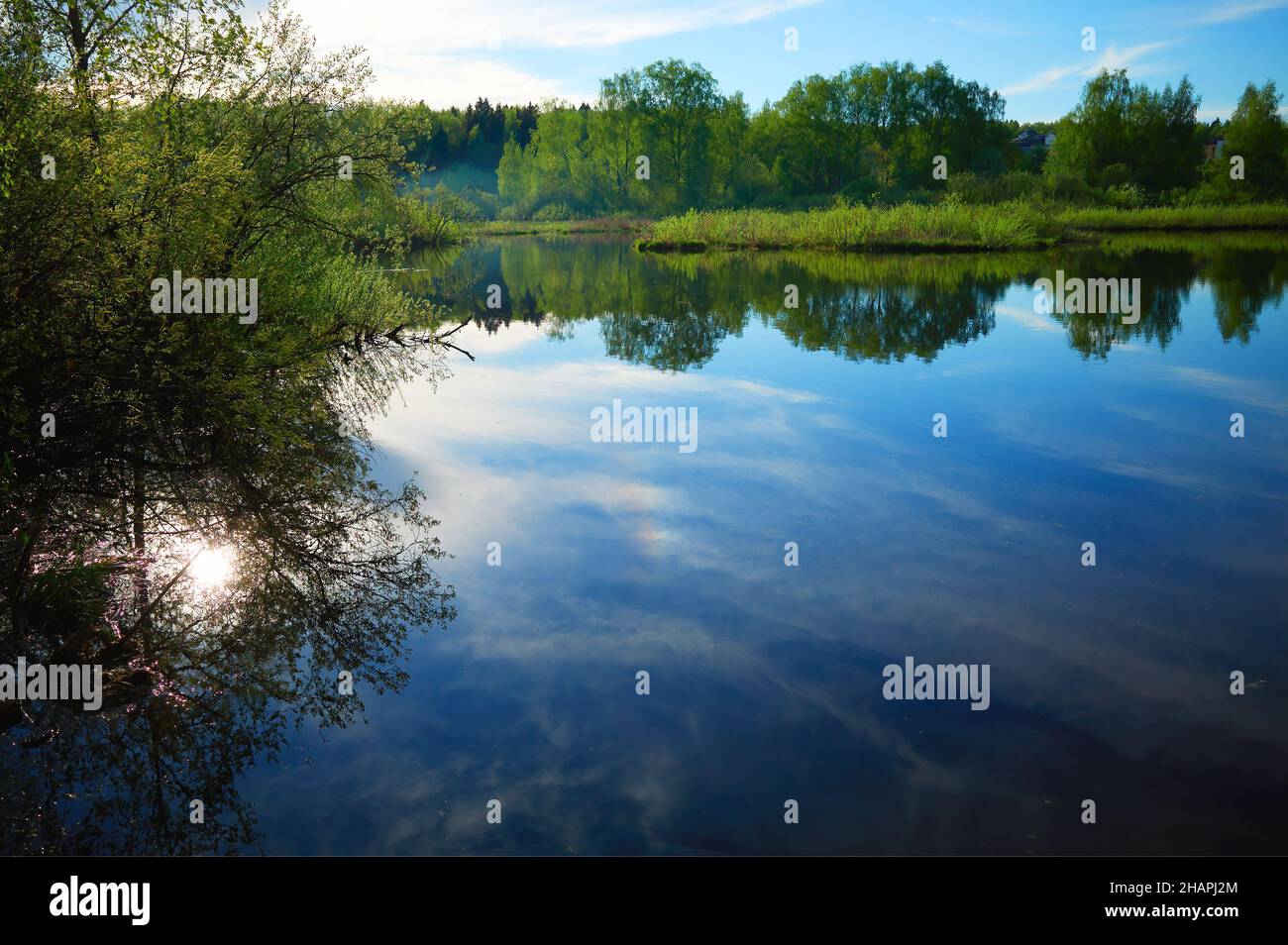 Smooth summer river landscape background Stock Photo - Alamy