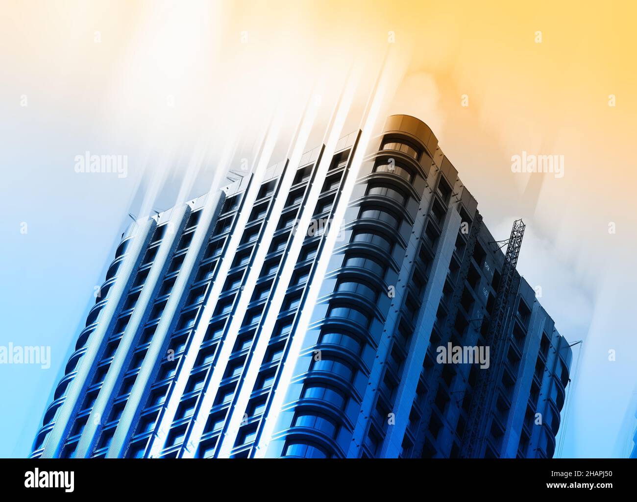 Abstract skyscraper during sunset time background Stock Photo - Alamy