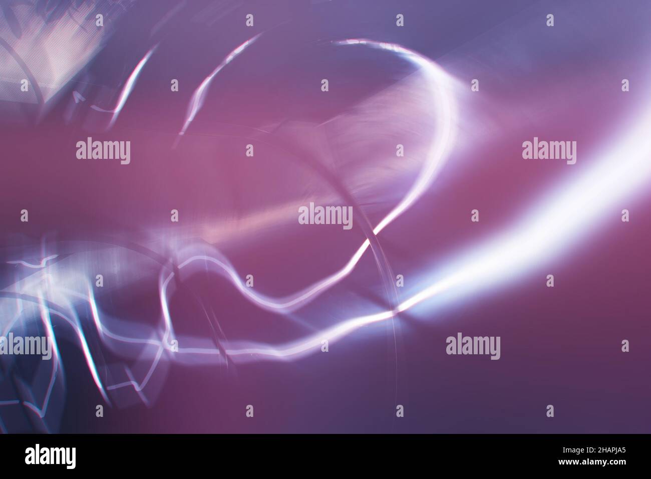 Abstract neon light trails background Stock Photo - Alamy