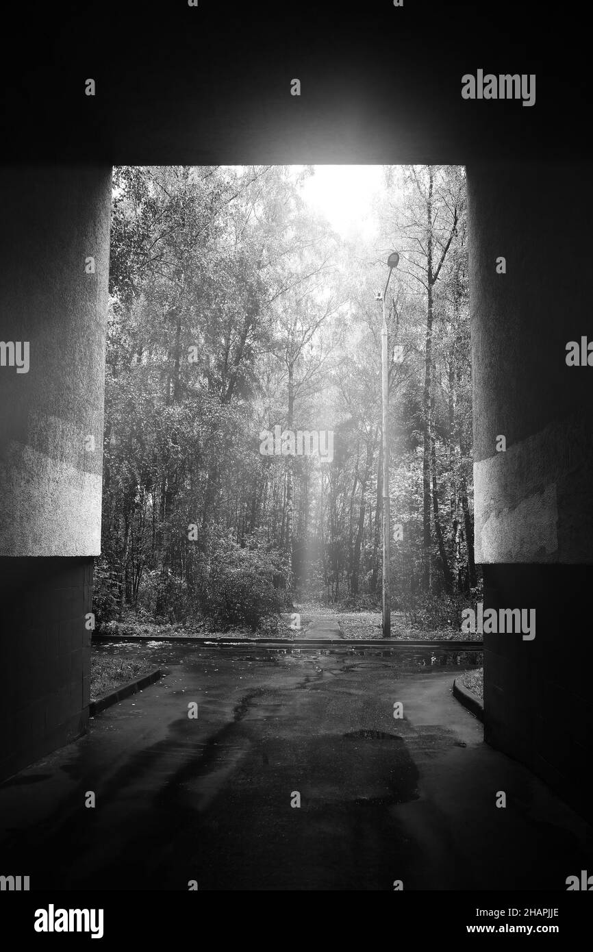 Dramatic light rays coming through concrete arc Stock Photo - Alamy