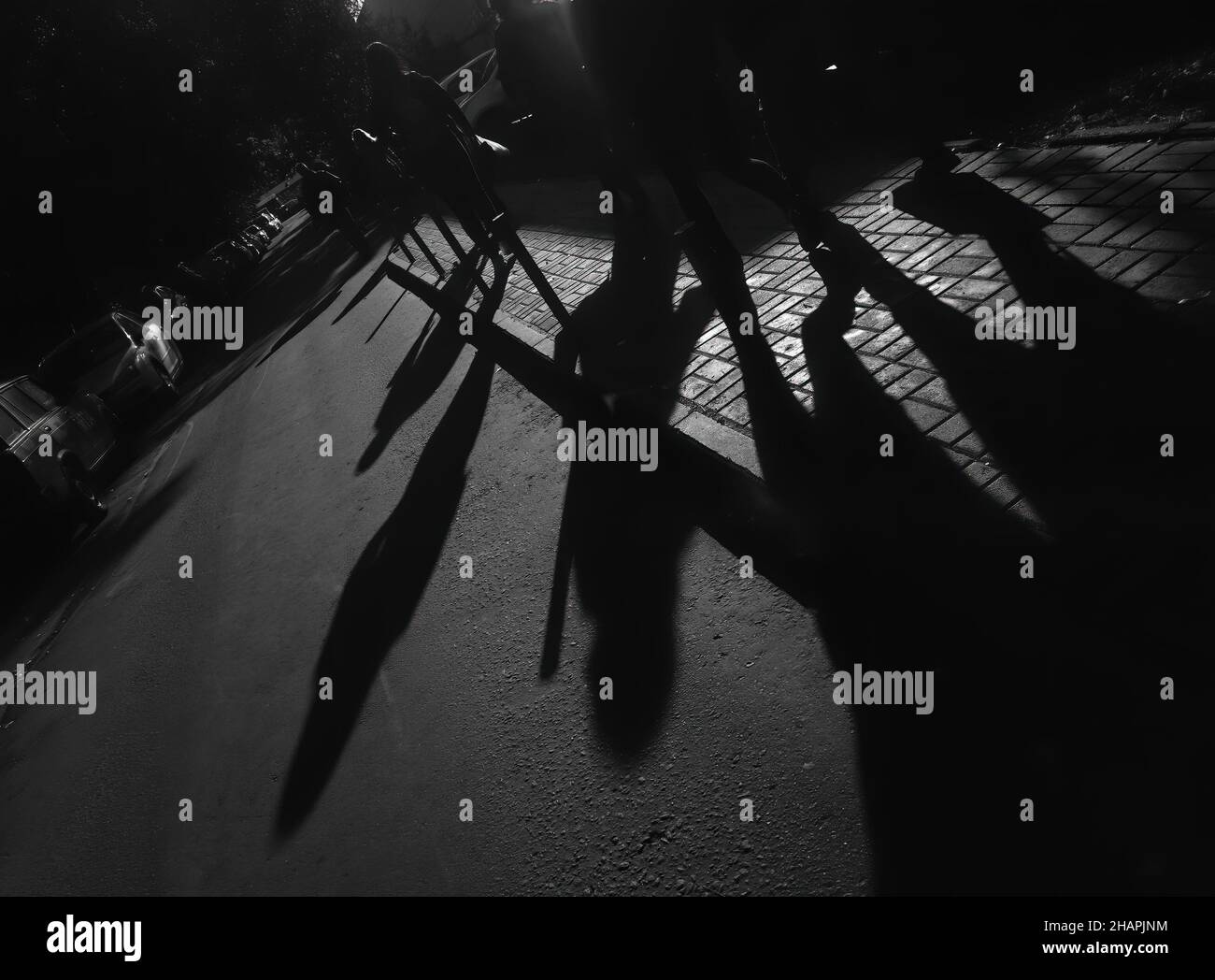 Diagonal street with walking people background Stock Photo - Alamy