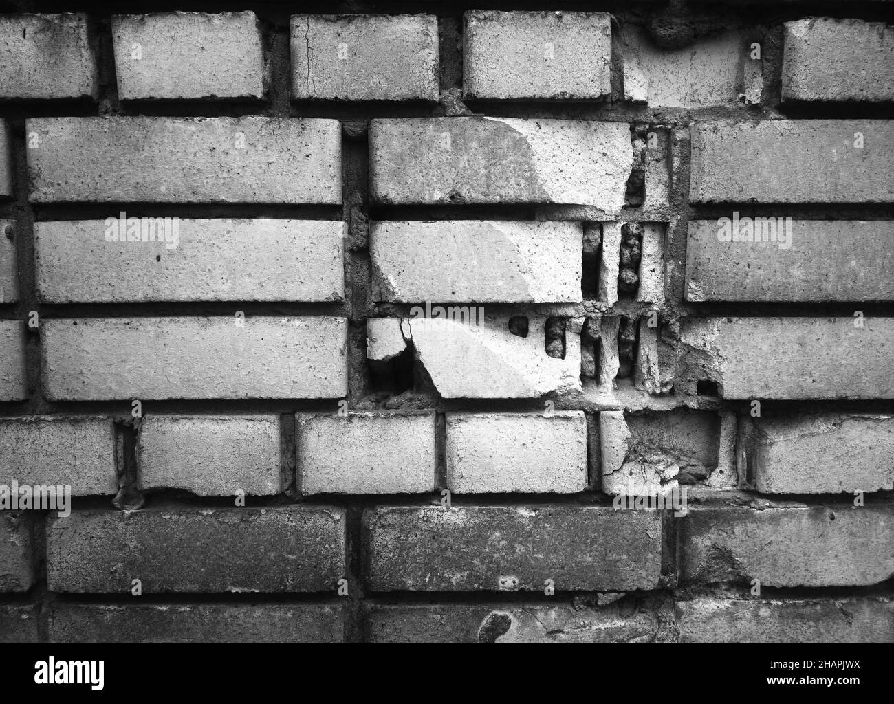 Black & white cracked bricked wall Stock Photo - Alamy