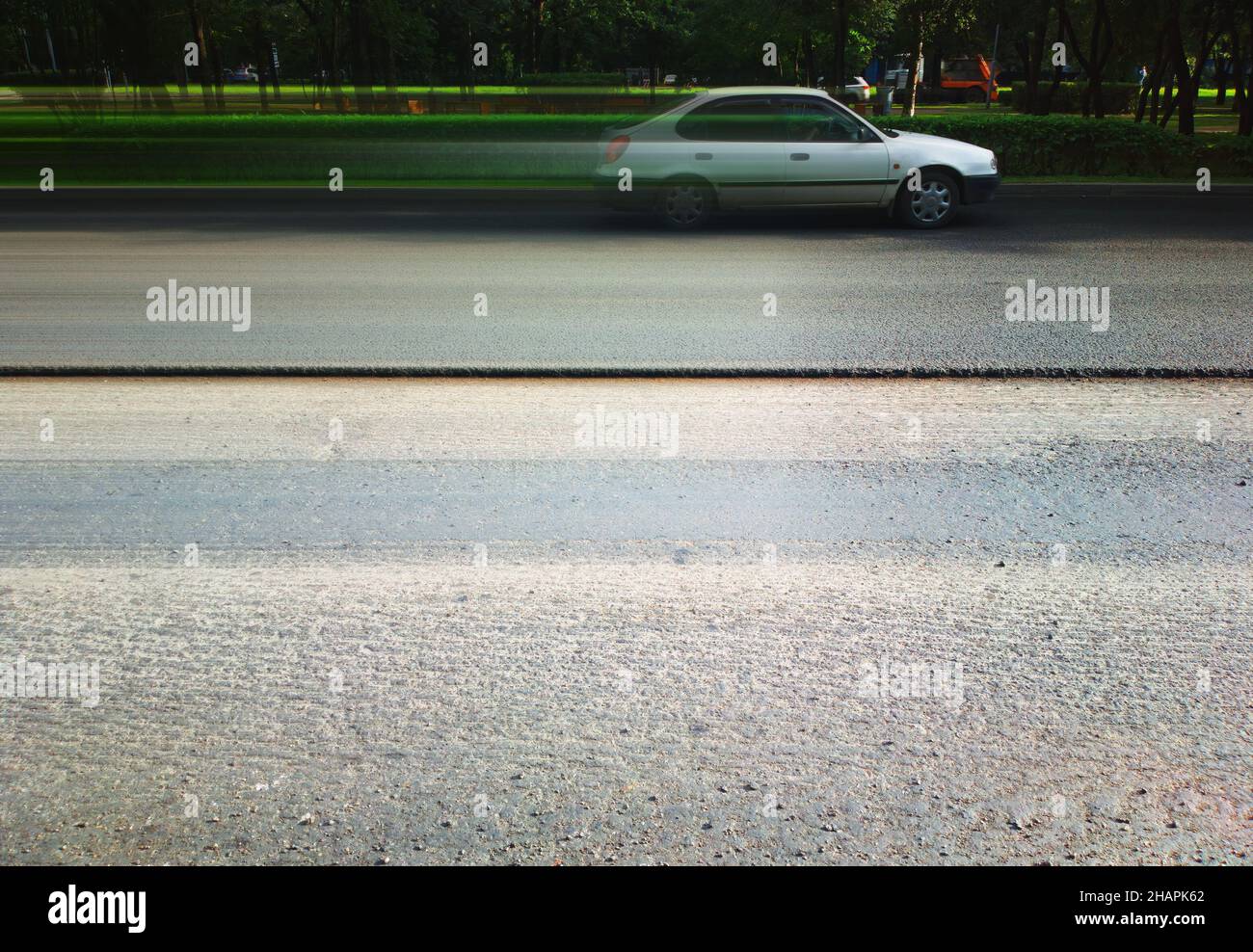 Moving car on newly fixed road transportation background Stock Photo ...