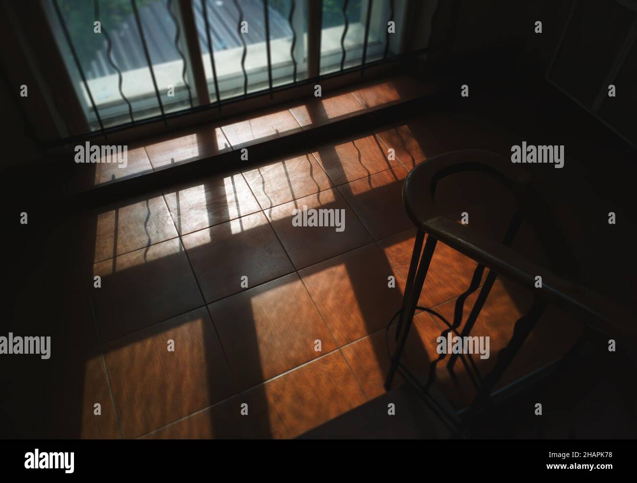 Light through window with dramatic shadows Stock Photo - Alamy