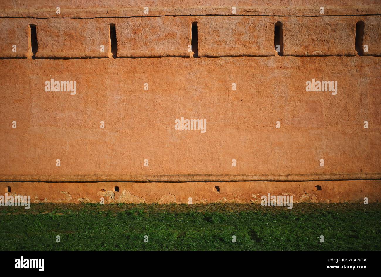 Medieval castle wall with embrasure background Stock Photo - Alamy