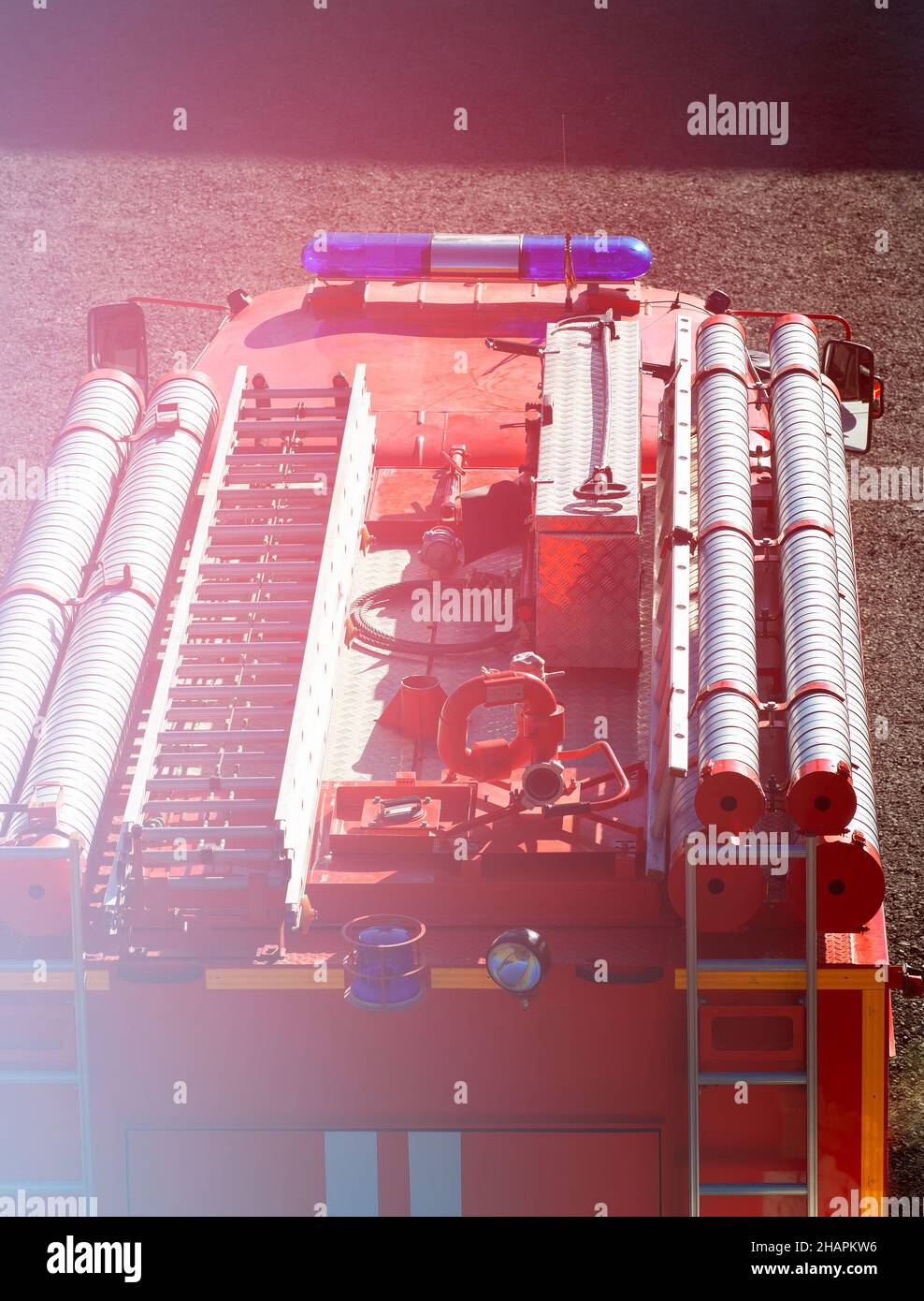 Red fire-engine machine in detail background Stock Photo - Alamy