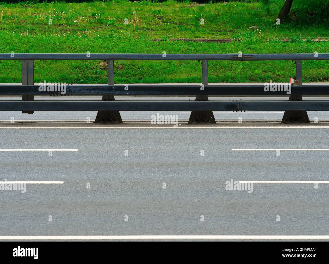 Empty separated road lanes background Stock Photo - Alamy