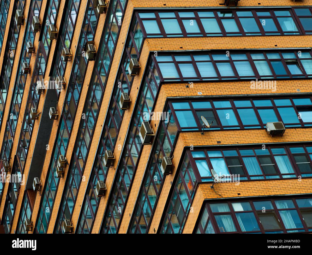 Tilted windows of many-storied building architecture backdrop Stock ...