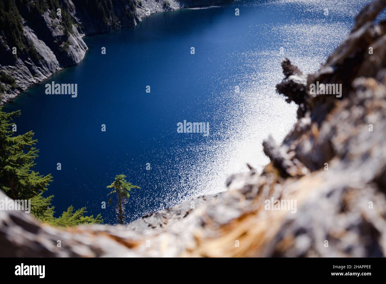 The lake down below with a little of the the dead tree in the ...