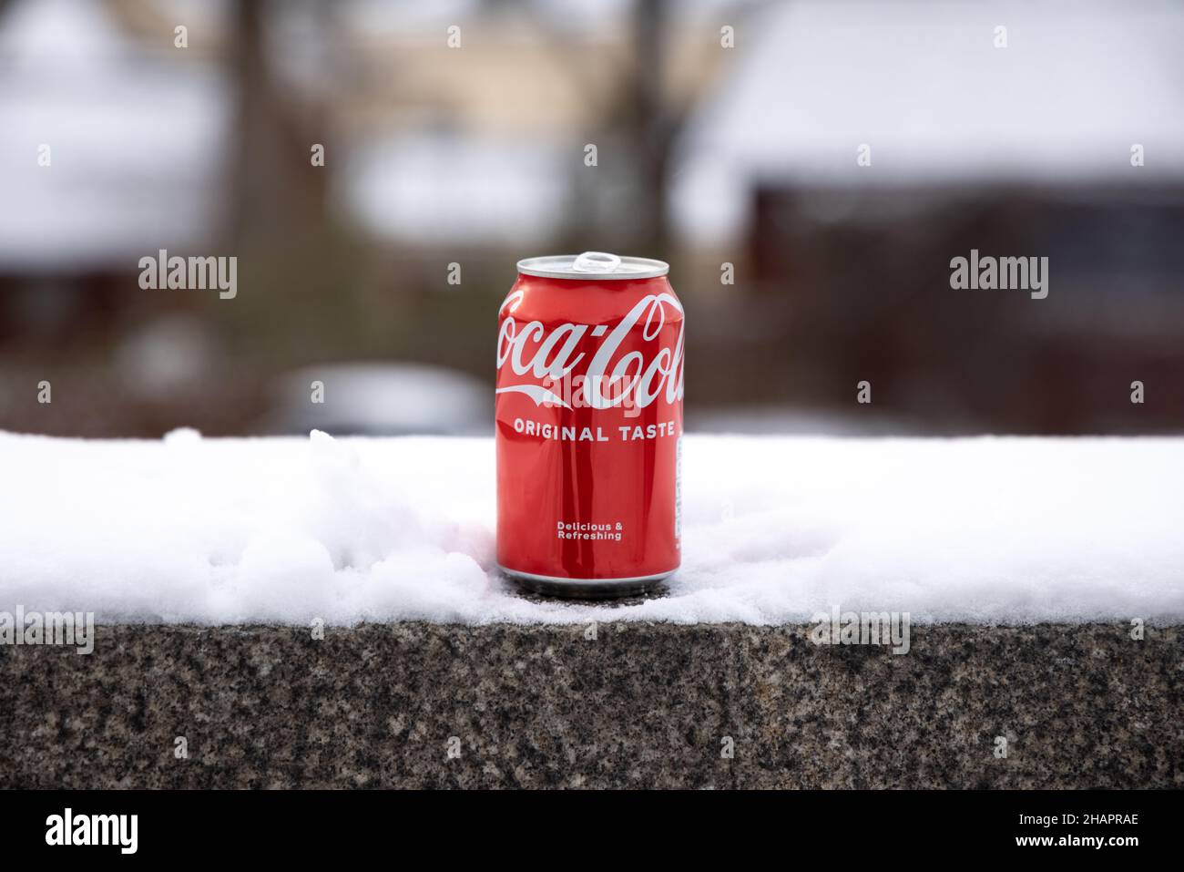 Coca cola can left in the city on the snow. Coca-cola is one of the ...