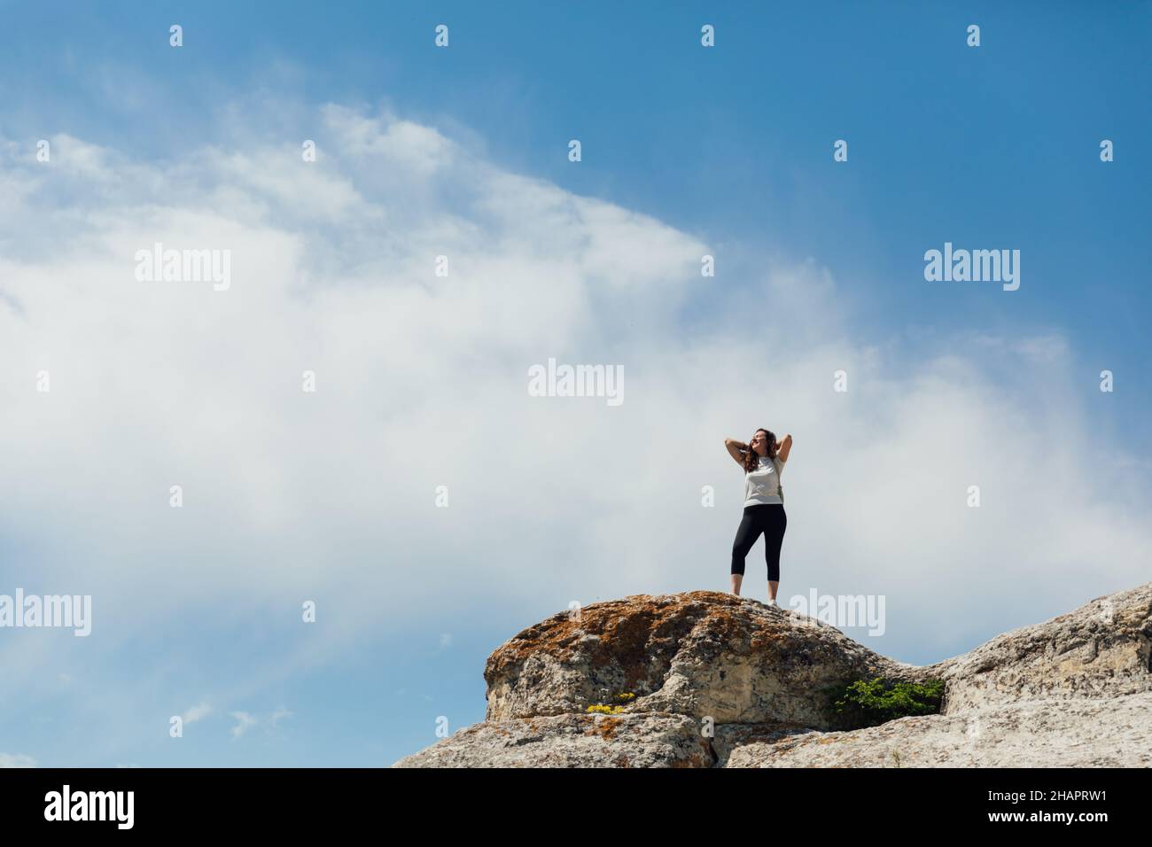 Watching sunrise cliff top hi-res stock photography and images - Alamy