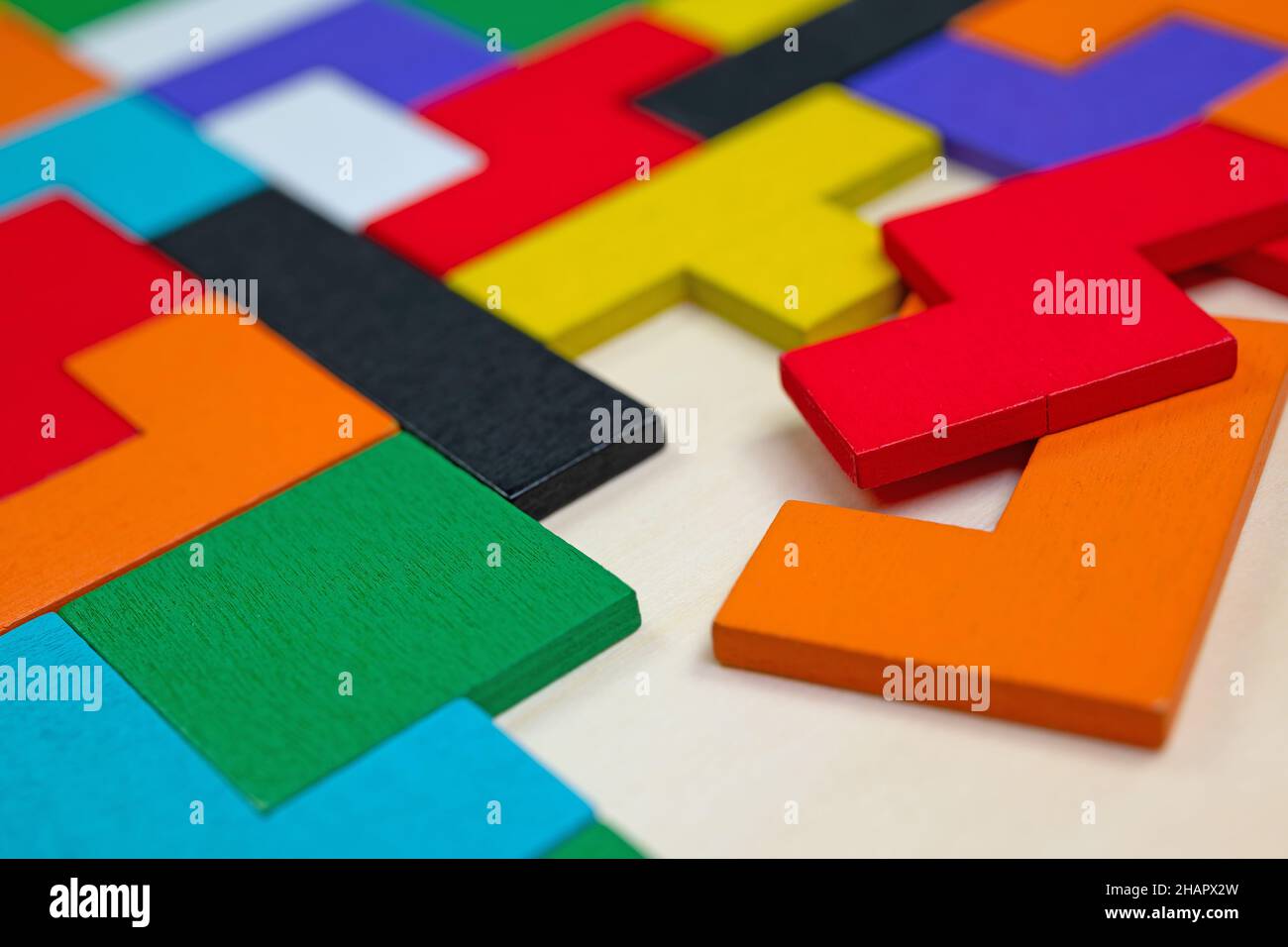 Colorful wooden puzzle pieces, put together Stock Photo - Alamy