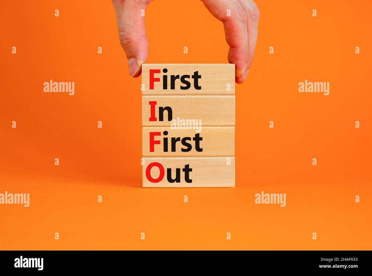 FIFO first in first out symbol. Concept words FIFO first in first out ...