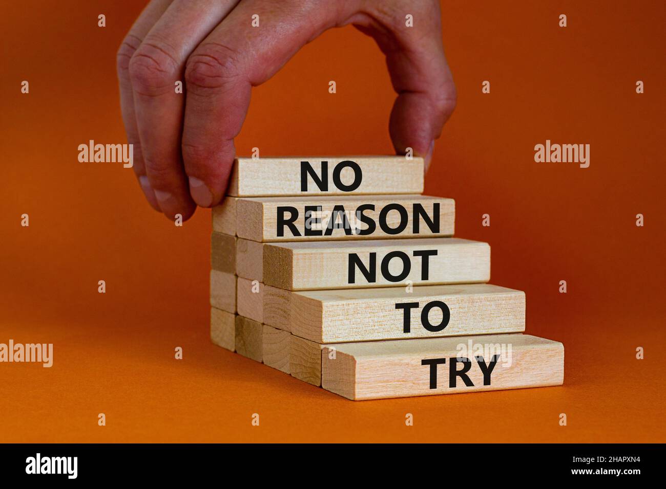 No reason not to try symbol. Wooden blocks with words No reason not to ...