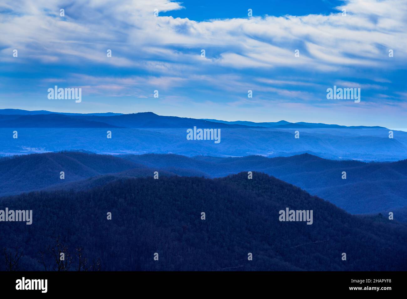 A blue tinged photo looking over the Blue Ridge Mountains Stock Photo ...