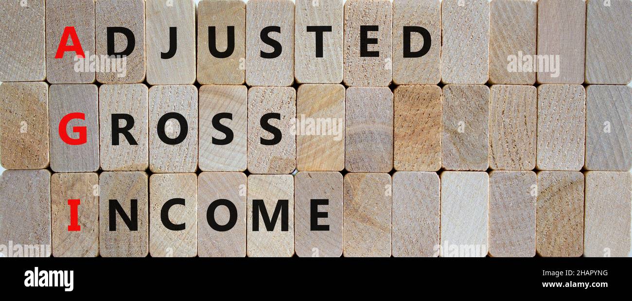 AGI adjusted gross income symbol. Concept words AGI adjusted gross ...