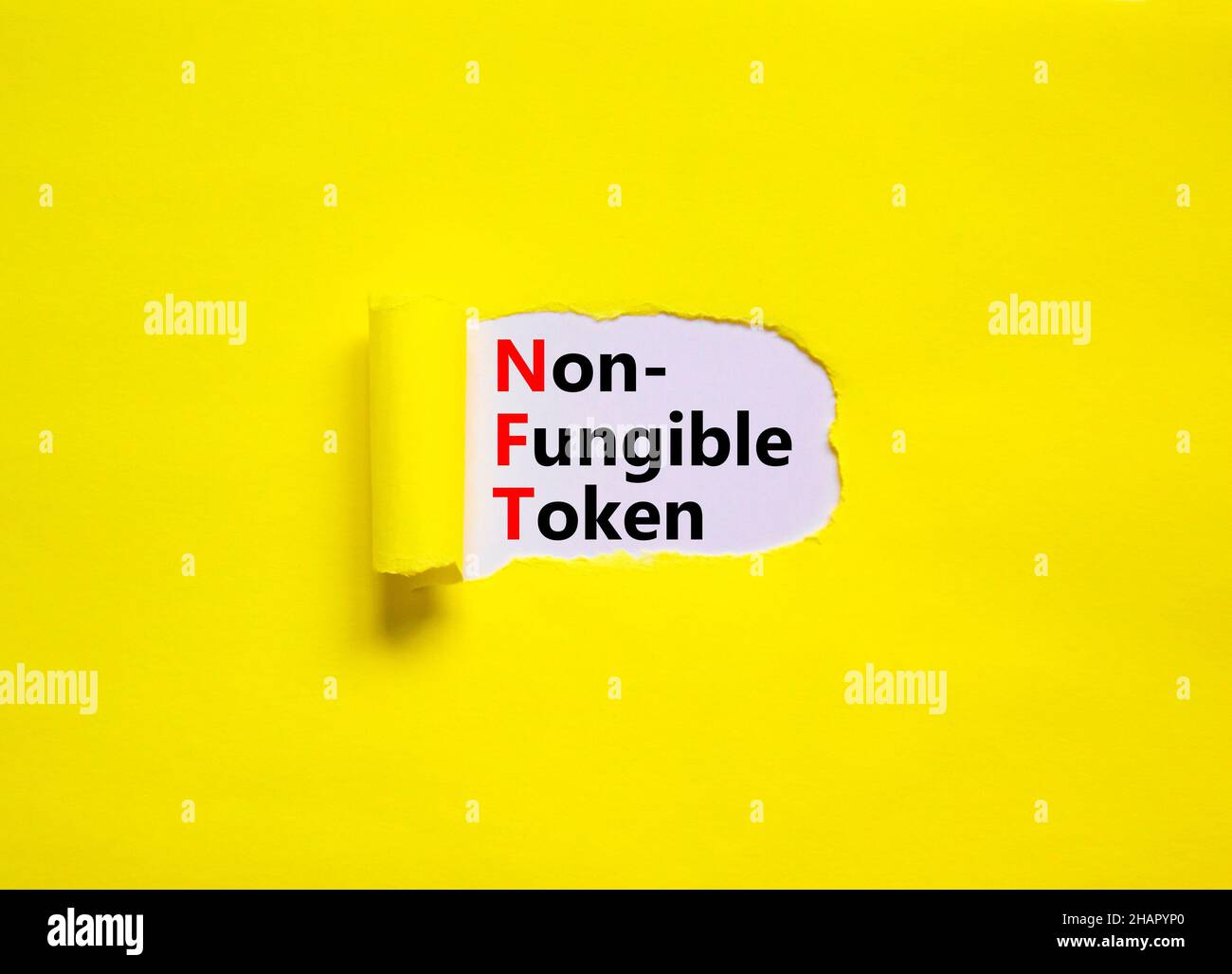 NFT non-fungible token symbol. Concept words NFT non-fungible token on ...