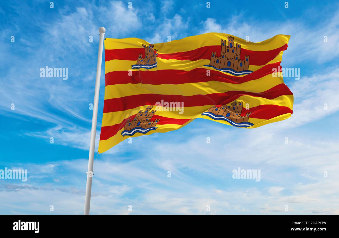 flag of Ibiza , Spain at cloudy sky background on sunset, panoramic ...