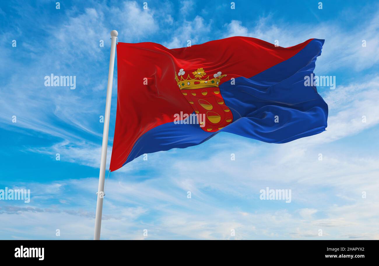 flag of Lanzarote , Spain at cloudy sky background on sunset, panoramic view. Spanish travel and ...