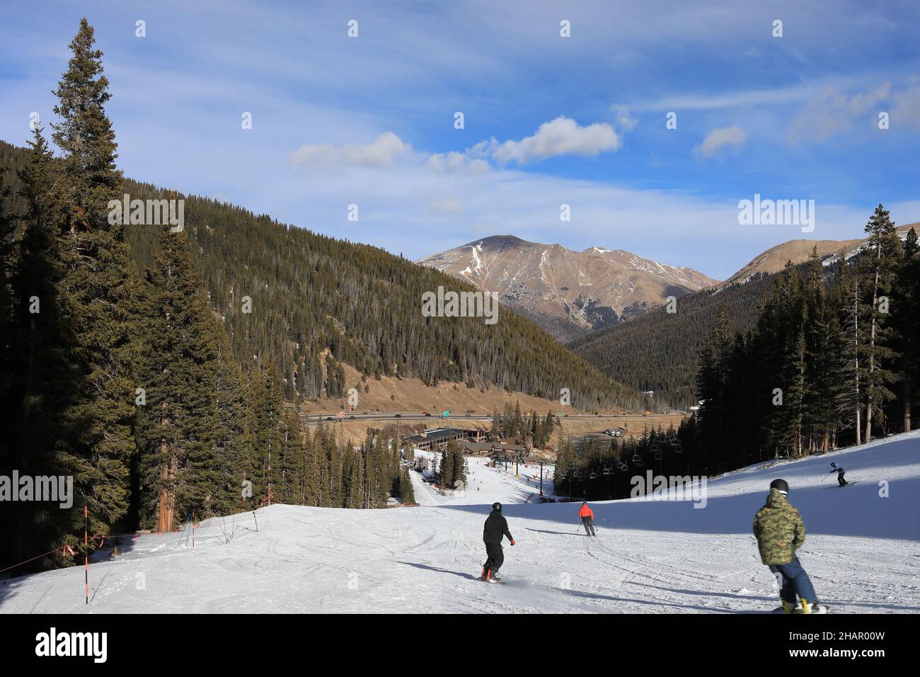 Skiing the snowy pistes Stock Photo - Alamy