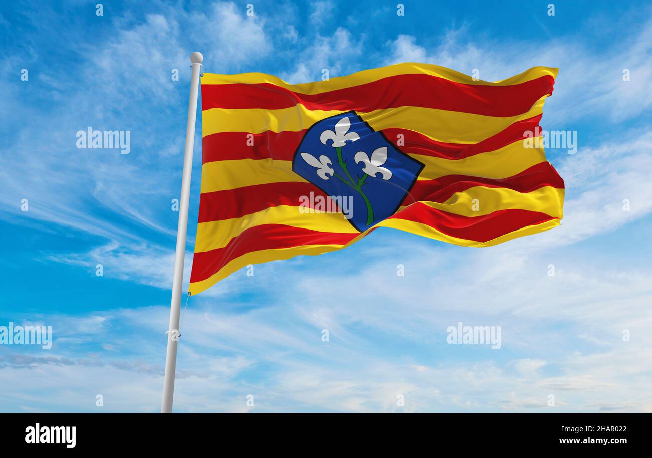 flag of Lerida , Spain at cloudy sky background on sunset, panoramic ...