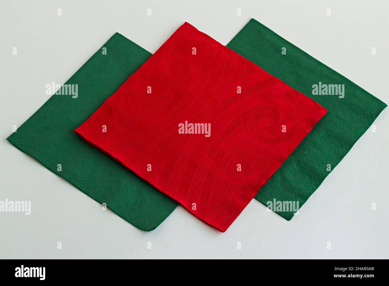 Vivid Red and Green Color Napkins on the white surface.Above view Stock ...