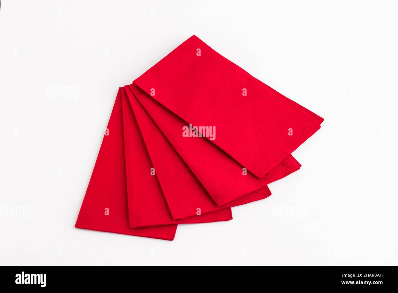 Red color paper napkins on white surface.Conceptual image of menu ...