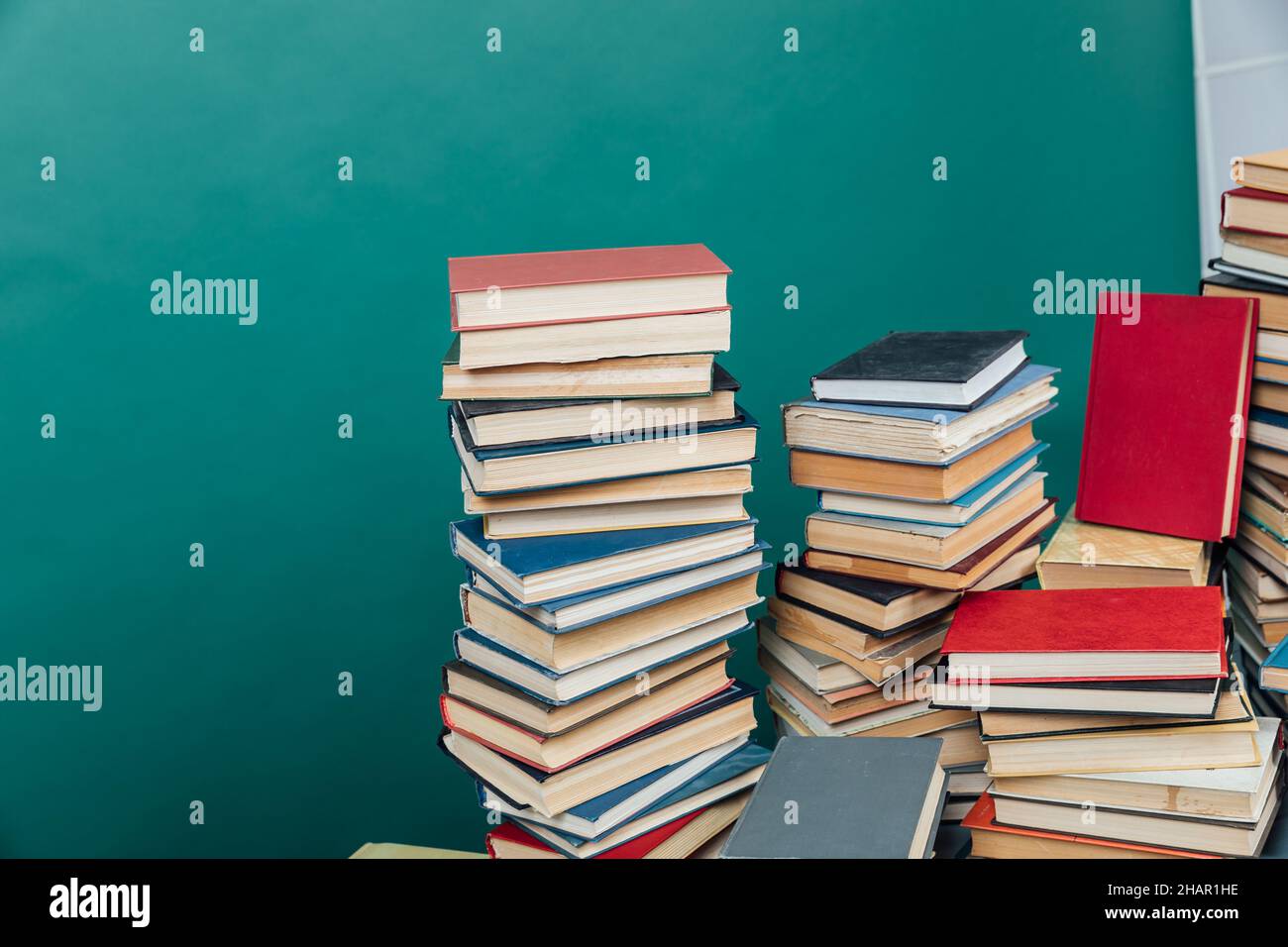 educational books for studying in the university library on a green ...