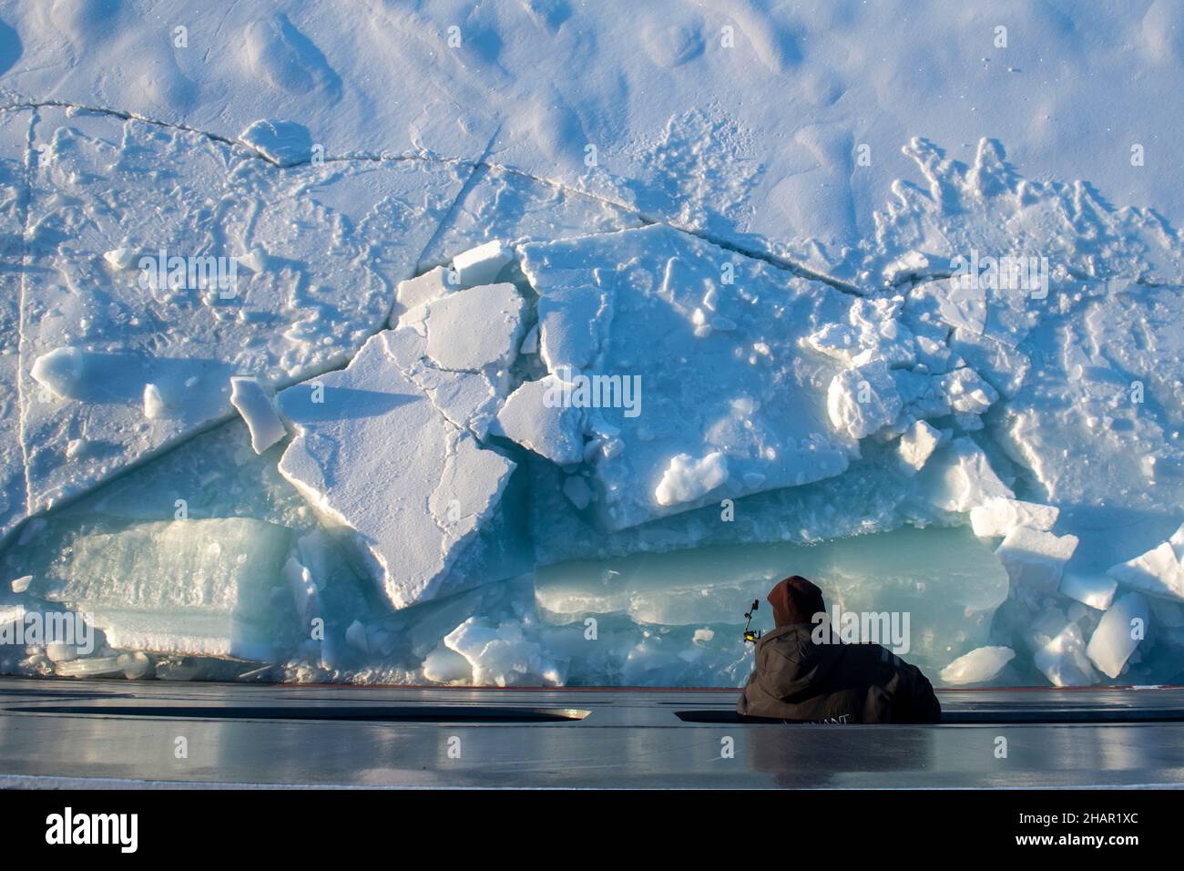 Arctic. Decks of the Le Commandant Charcot in polar landscape, green ...