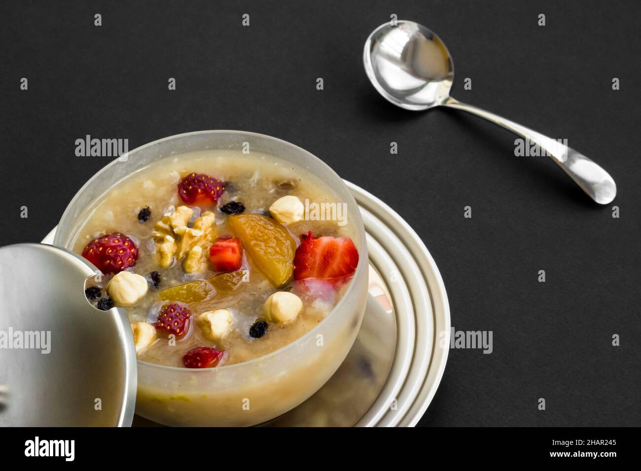 Traditional Turkish Dessert Asure or Noah's Ark Pudding on black ...