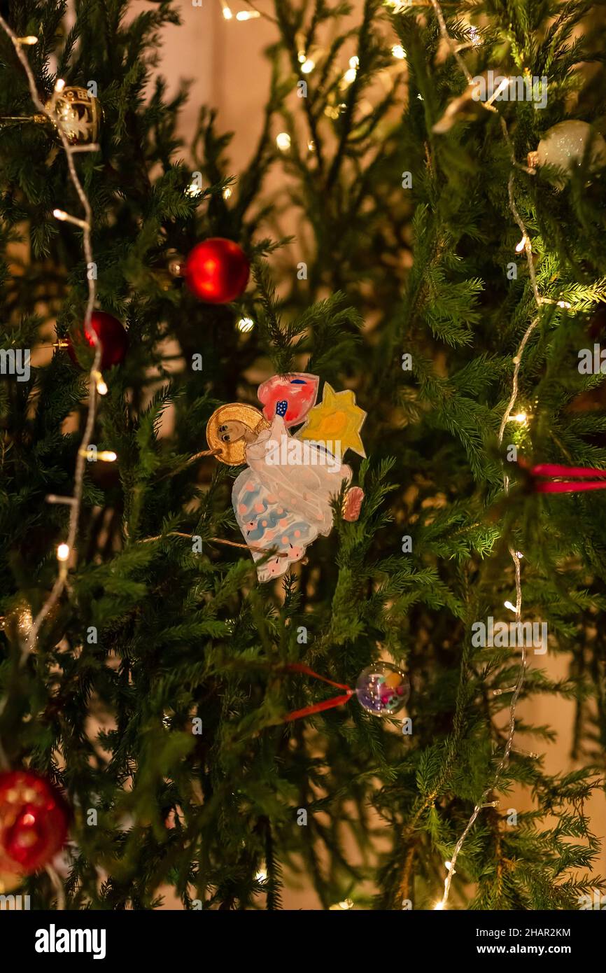 Decorated Christmas tree, angel in Orthodox church on Christmas eve ...