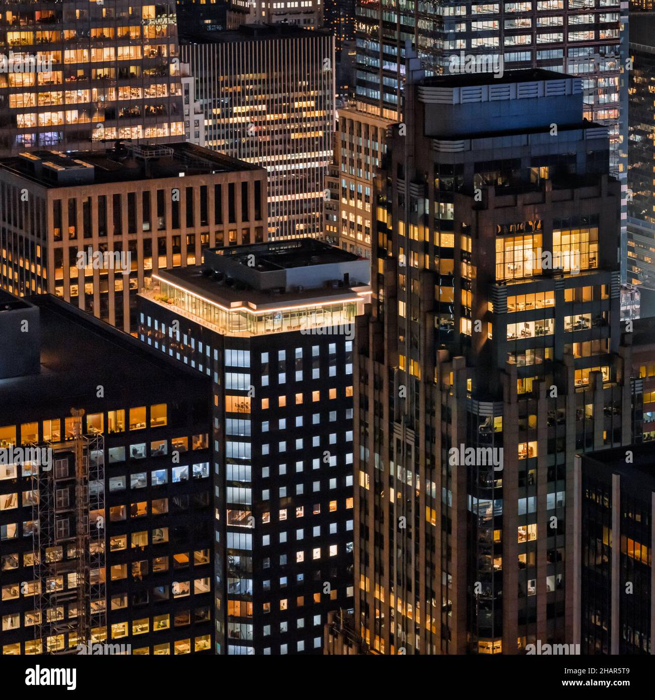 View into city high-rises at night Stock Photo - Alamy