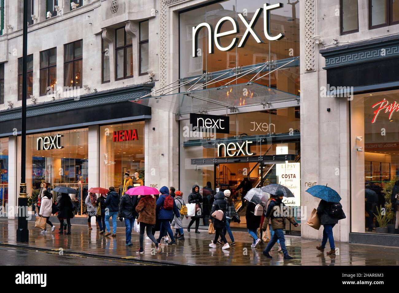 Next clothing logo clothes shop store uk sign hi-res stock photography ...