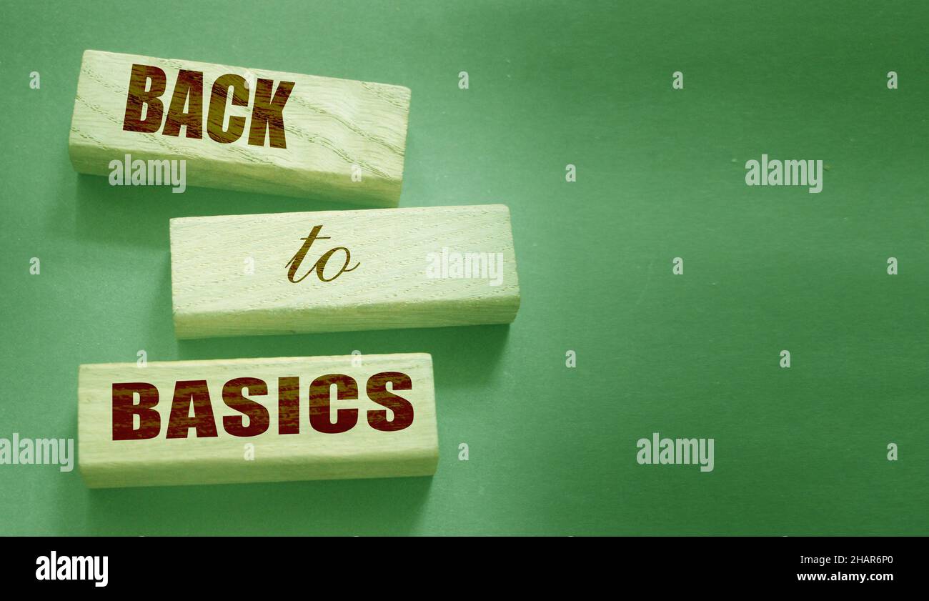 The words back to basics made of letters on wooden blocks. back to ...