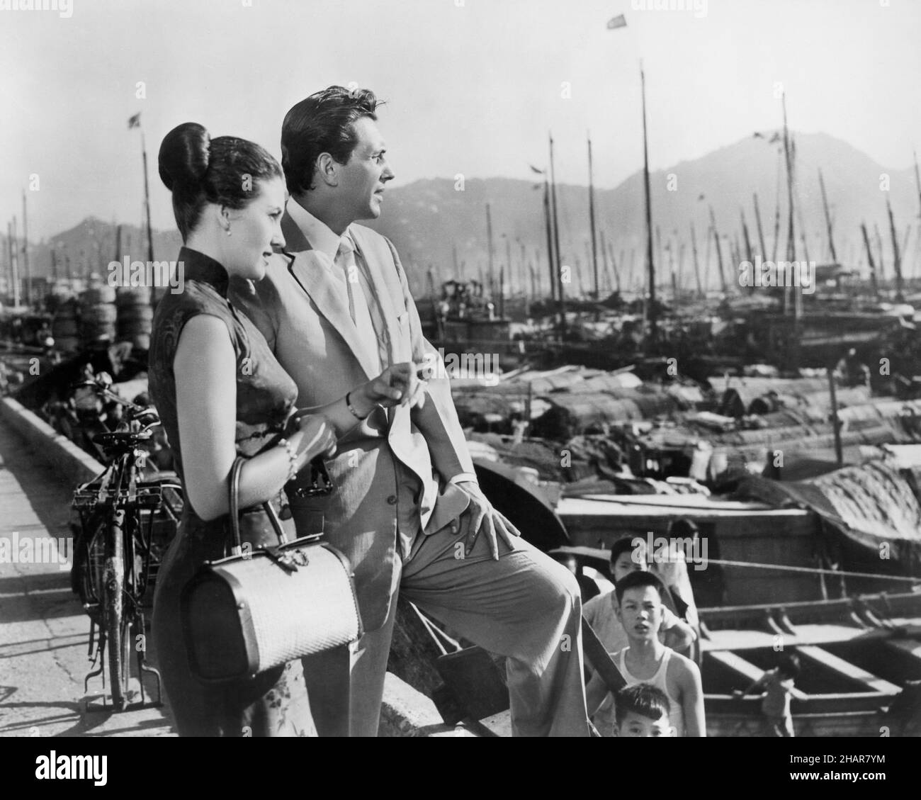 May Wynn, Jack Kelly, on-set of the Film, "Hong Kong Affair", Allied Artists, 1958 Stock Photo ...