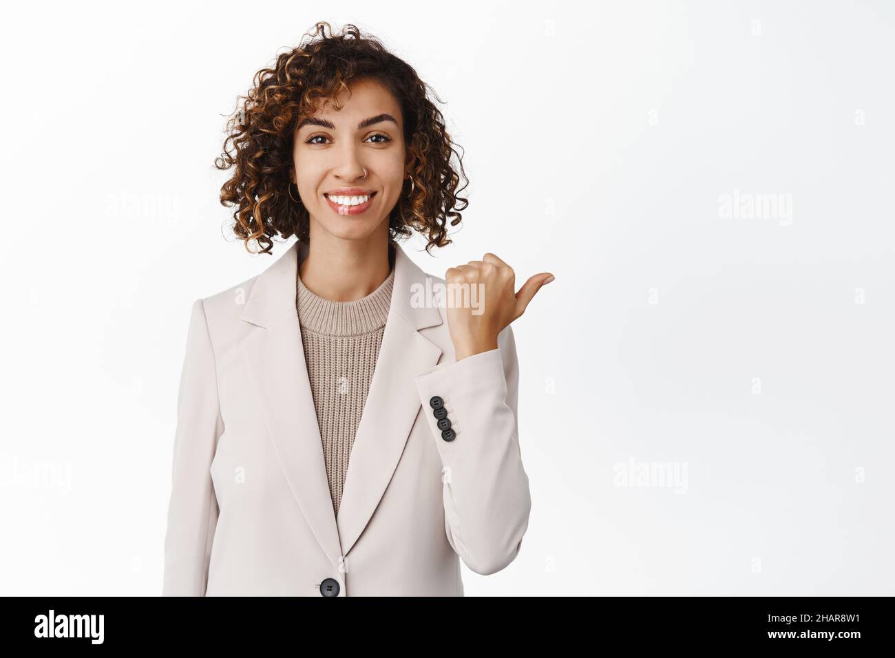 Successful real estate agent, female entrepreneur pointing right ...