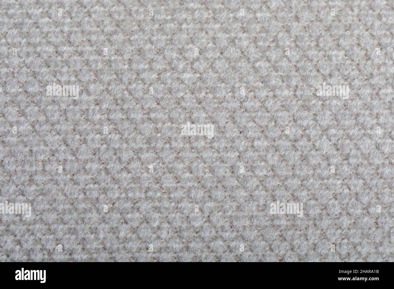 Grey fabric texture. Furniture upholstery textiles. Embossed pattern ...