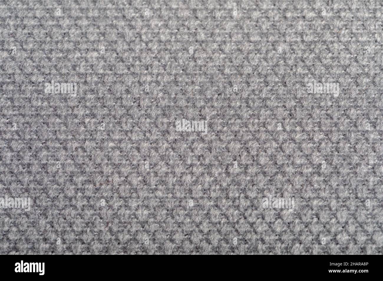 Grey fabric texture. Furniture upholstery textiles. Embossed pattern ...